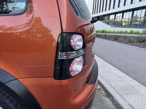 Orange Volkswagen Touran 2007 in Riga, with an engine capacity of 1.40 L and mileage of 146 thousand km for 4295 €, photo 13 on AUTOMOTO.COM.LV