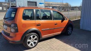Oranžs Volkswagen Touran 2007 Cēsis, ar dzinēja tilpumu 1.90 L un nobraukumu 330 tūkst. km par 1700 €, foto  vietnē AUTOMOTO.COM.LV