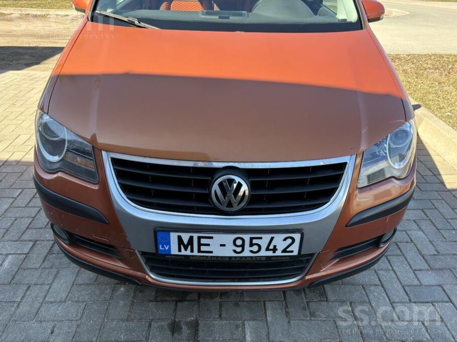 Oranžs Volkswagen Touran 2007 Cēsis, ar dzinēja tilpumu 1.90 L un nobraukumu 330 tūkst. km par 1700 €, foto 5 vietnē AUTOMOTO.COM.LV