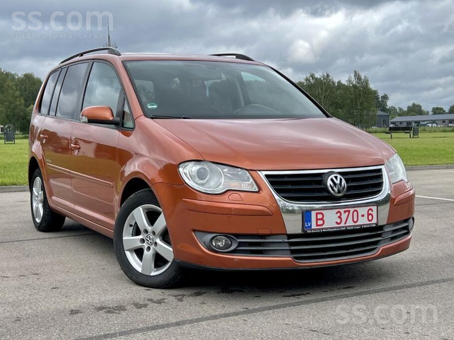 Oranžs Volkswagen Touran 2008 Cēsis, ar dzinēja tilpumu 2.00 L un nobraukumu 274 tūkst. km par 3850 €, foto 1 vietnē AUTOMOTO.COM.LV