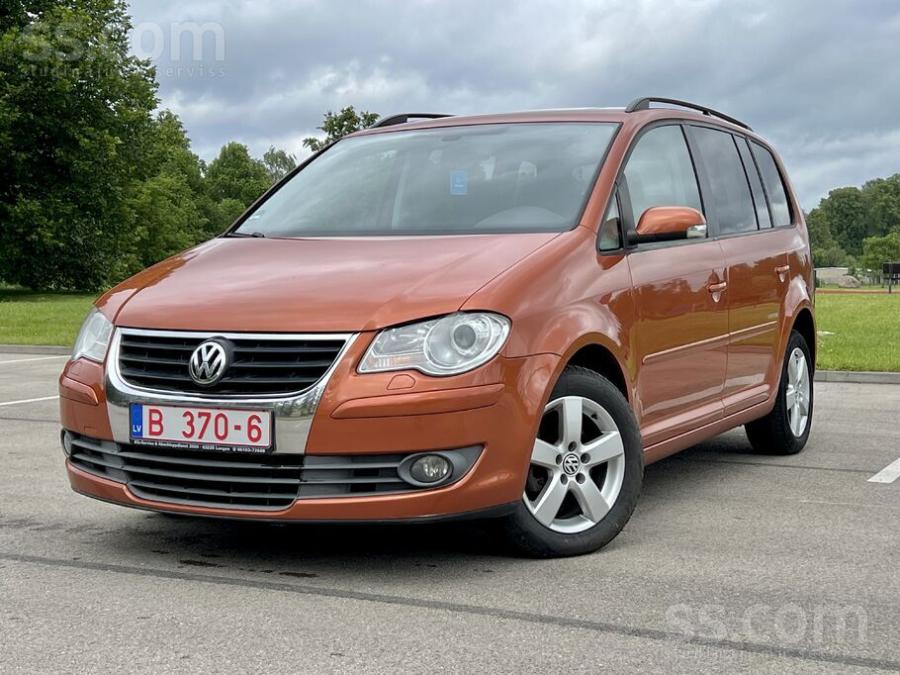 Oranžs Volkswagen Touran 2008 Cēsis, ar dzinēja tilpumu 2.00 L un nobraukumu 274 tūkst. km par 3850 €, foto 3 vietnē AUTOMOTO.COM.LV