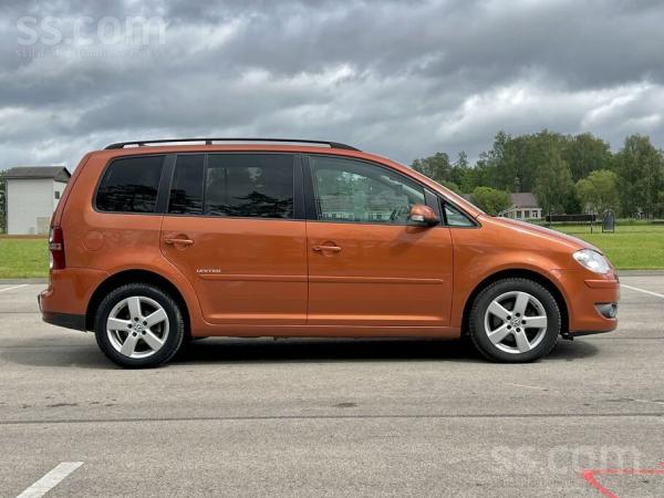 Oranžs Volkswagen Touran 2008 Cēsis, ar dzinēja tilpumu 2.00 L un nobraukumu 274 tūkst. km par 3850 €, foto 6 vietnē AUTOMOTO.COM.LV
