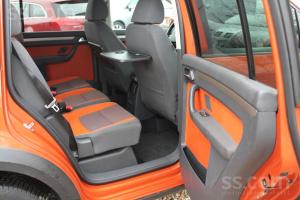 Orange Volkswagen Touran 2008 in Daugavpils, with an engine capacity of 1.40 L and mileage of 225 thousand km for 4690 €, photo 11 on AUTOMOTO.COM.LV
