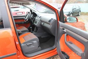 Orange Volkswagen Touran 2008 in Daugavpils, with an engine capacity of 1.40 L and mileage of 225 thousand km for 4690 €, photo 10 on AUTOMOTO.COM.LV