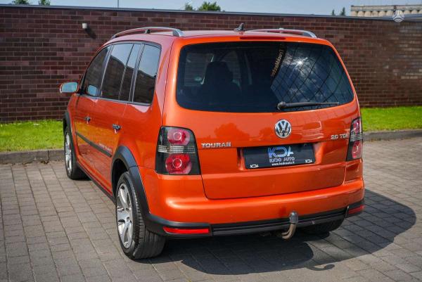 Oranžs Volkswagen Touran 2008 Marijampole, ar dzinēja tilpumu 1.97 L un nobraukumu 312 tūkst. km par 4950 €, foto 9 vietnē AUTOMOTO.COM.LV