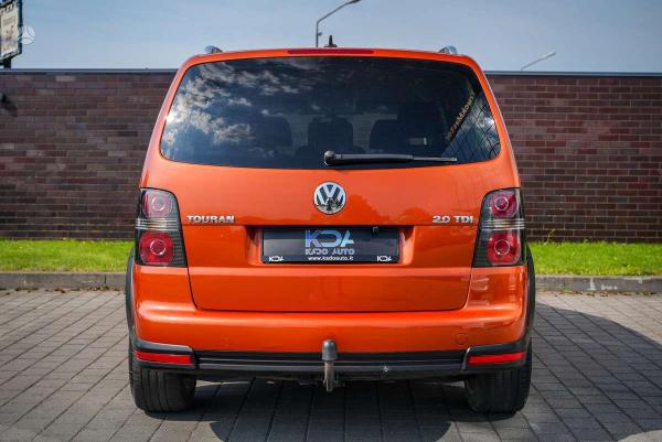 Oranžs Volkswagen Touran 2008 Marijampole, ar dzinēja tilpumu 1.97 L un nobraukumu 312 tūkst. km par 4950 €, foto 10 vietnē AUTOMOTO.COM.LV