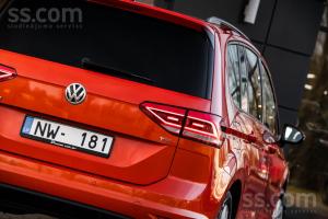 Orange Volkswagen Touran 2016 in Jelgava, with an engine capacity of 1.60 L and mileage of 0 thousand km for 10999 €, photo 13 on AUTOMOTO.COM.LV