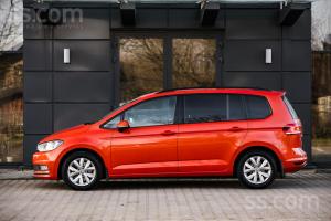 Orange Volkswagen Touran 2016 in Jelgava, with an engine capacity of 1.60 L and mileage of 0 thousand km for 10999 €, photo 15 on AUTOMOTO.COM.LV