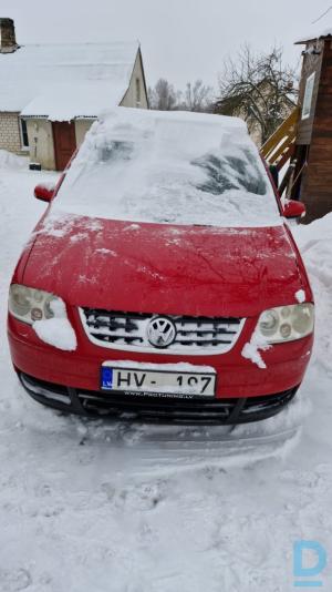 Sarkans Volkswagen Touran 2005 Alūksne, ar dzinēja tilpumu 1.90 L un nobraukumu 348 tūkst. km par 2000 €, foto  vietnē AUTOMOTO.COM.LV