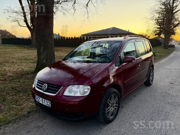 Red Volkswagen Touran 2003 in Jelgava, with an engine capacity of 1.90 L and mileage of 484 thousand km for 1200 €, photo 1 on AUTOMOTO.COM.LV
