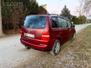 Red Volkswagen Touran 2003 in Jelgava, with an engine capacity of 1.90 L and mileage of 484 thousand km for 1200 €, photo 3 on AUTOMOTO.COM.LV