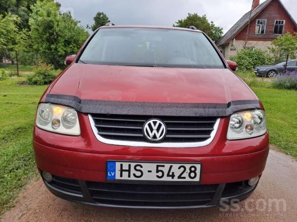 Sarkans Volkswagen Touran 2003 Alūksne, ar dzinēja tilpumu 1.90 L un nobraukumu 451 tūkst. km par 705 €, foto 7 vietnē AUTOMOTO.COM.LV