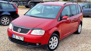 Red Volkswagen Touran 2003 in Cesis, with an engine capacity of 1.90 L and mileage of 371 thousand km for 1800 €, photo  on AUTOMOTO.COM.LV