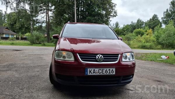 Red Volkswagen Touran 2003 in Daugavpils, with an engine capacity of 1.90 L and mileage of 282 thousand km for 1990 €, photo 2 on AUTOMOTO.COM.LV