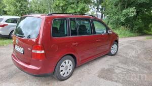 Red Volkswagen Touran 2003 in Daugavpils, with an engine capacity of 1.90 L and mileage of 282 thousand km for 1990 €, photo 8 on AUTOMOTO.COM.LV
