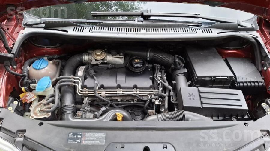 Red Volkswagen Touran 2003 in Daugavpils, with an engine capacity of 1.90 L and mileage of 282 thousand km for 1990 €, photo 14 on AUTOMOTO.COM.LV