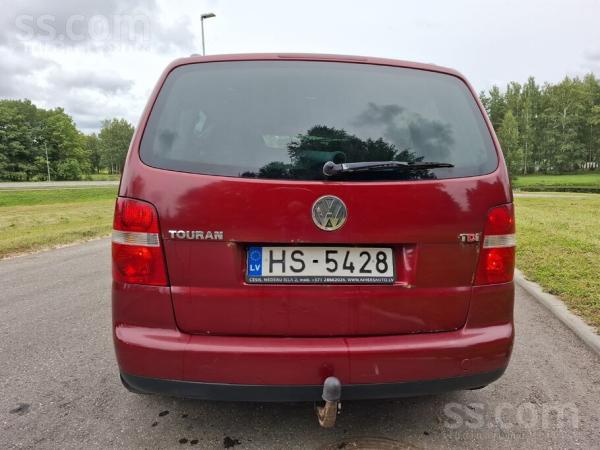 Sarkans Volkswagen Touran 2003 Alūksne, ar dzinēja tilpumu 1.90 L un nobraukumu 442 tūkst. km par 1235 €, foto 6 vietnē AUTOMOTO.COM.LV