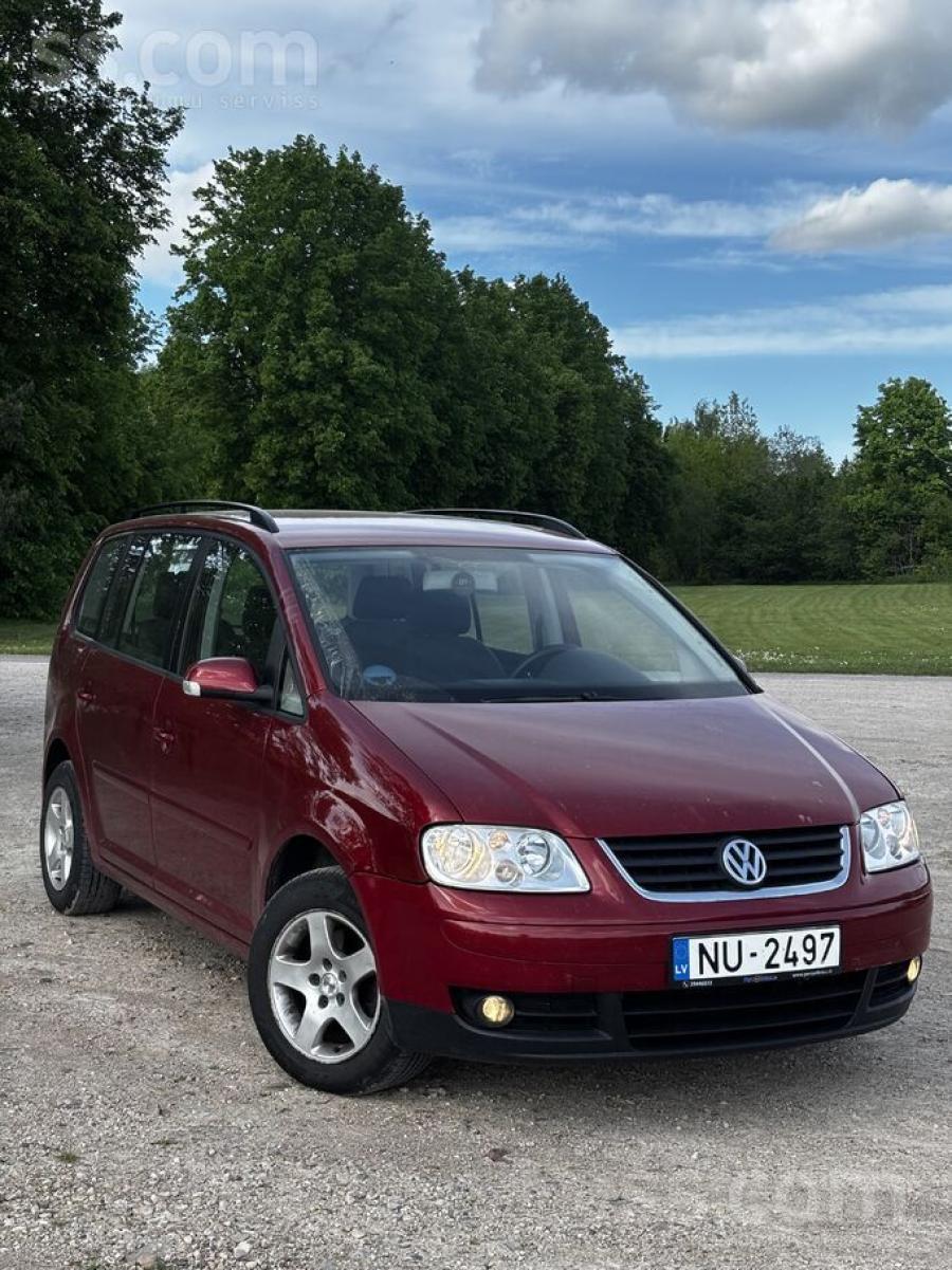 Red Volkswagen Touran 2004 in Ogre, with an engine capacity of 1.90 L and mileage of 216 thousand km for 1850 €, photo 1 on AUTOMOTO.COM.LV