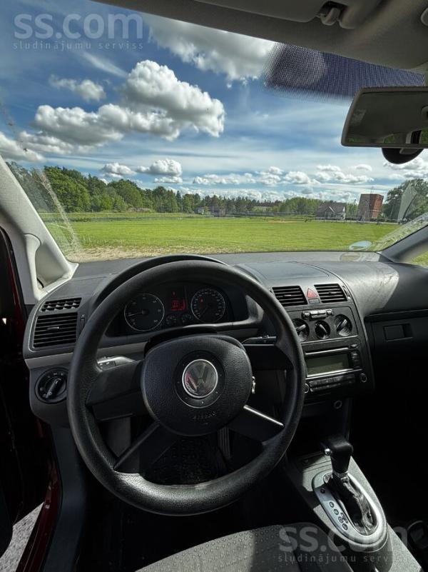 Red Volkswagen Touran 2004 in Ogre, with an engine capacity of 1.90 L and mileage of 216 thousand km for 1850 €, photo 5 on AUTOMOTO.COM.LV