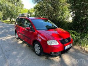 Sarkans Volkswagen Touran 2004 Rīga, ar dzinēja tilpumu 1.60 L un nobraukumu 285 tūkst. km par 700 €, foto 4 vietnē AUTOMOTO.COM.LV