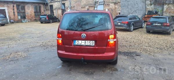 Sarkans Volkswagen Touran 2005 Rīga, ar dzinēja tilpumu 2.00 L un nobraukumu 230 tūkst. km par 3500 €, foto 2 vietnē AUTOMOTO.COM.LV
