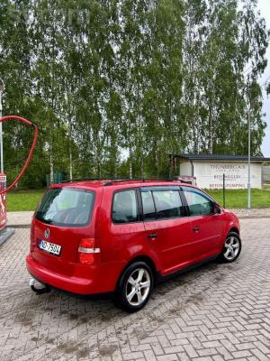 Sarkans Volkswagen Touran 2005 Rēzekne, ar dzinēja tilpumu 1.90 L un nobraukumu 470 tūkst. km par 1500 €, foto 4 vietnē AUTOMOTO.COM.LV