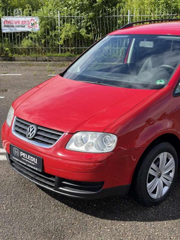 Red Volkswagen Touran 2005 in Kedainiai, with an engine capacity of 1.90 L and mileage of 192 thousand km for 2800 €, photo 8 on AUTOMOTO.COM.LV