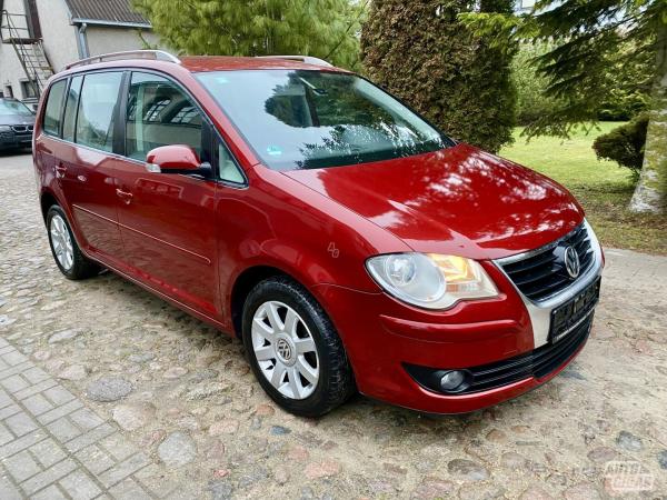 Red Volkswagen Touran 2006 in Siauliai, with an engine capacity of 1.40 L and mileage of 178 thousand km for 2999 €, photo 2 on AUTOMOTO.COM.LV