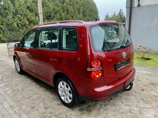 Red Volkswagen Touran 2006 in Siauliai, with an engine capacity of 1.40 L and mileage of 178 thousand km for 2999 €, photo 5 on AUTOMOTO.COM.LV