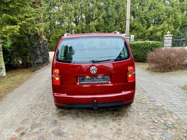Red Volkswagen Touran 2006 in Siauliai, with an engine capacity of 1.40 L and mileage of 178 thousand km for 2999 €, photo 7 on AUTOMOTO.COM.LV