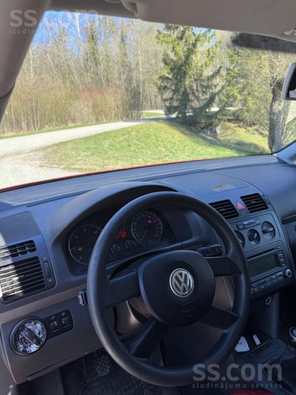 Red Volkswagen Touran 2006 in Cesis, with an engine capacity of 1.90 L and mileage of 305 thousand km for 949 €, photo 8 on AUTOMOTO.COM.LV