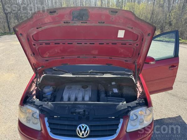 Red Volkswagen Touran 2006 in Cesis, with an engine capacity of 1.90 L and mileage of 305 thousand km for 949 €, photo 9 on AUTOMOTO.COM.LV