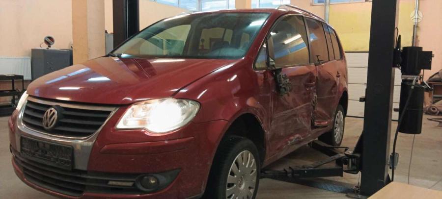 Sarkans Volkswagen Touran 2007 Radviliškis, ar dzinēja tilpumu 1.90 L un nobraukumu 374 tūkst. km par 600 €, foto 2 vietnē AUTOMOTO.COM.LV