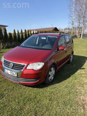 Sarkans Volkswagen Touran 2007 Rīga, ar dzinēja tilpumu 1.90 L un nobraukumu 28 tūkst. km par 2500 €, foto 7 vietnē AUTOMOTO.COM.LV