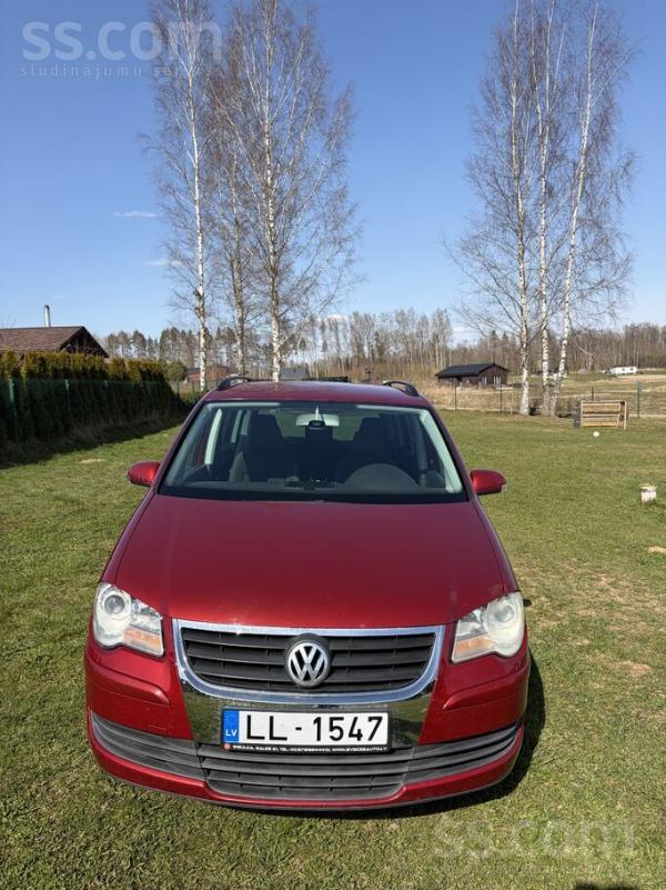 Sarkans Volkswagen Touran 2007 Rīga, ar dzinēja tilpumu 1.90 L un nobraukumu 28 tūkst. km par 2500 €, foto 7 vietnē AUTOMOTO.COM.LV