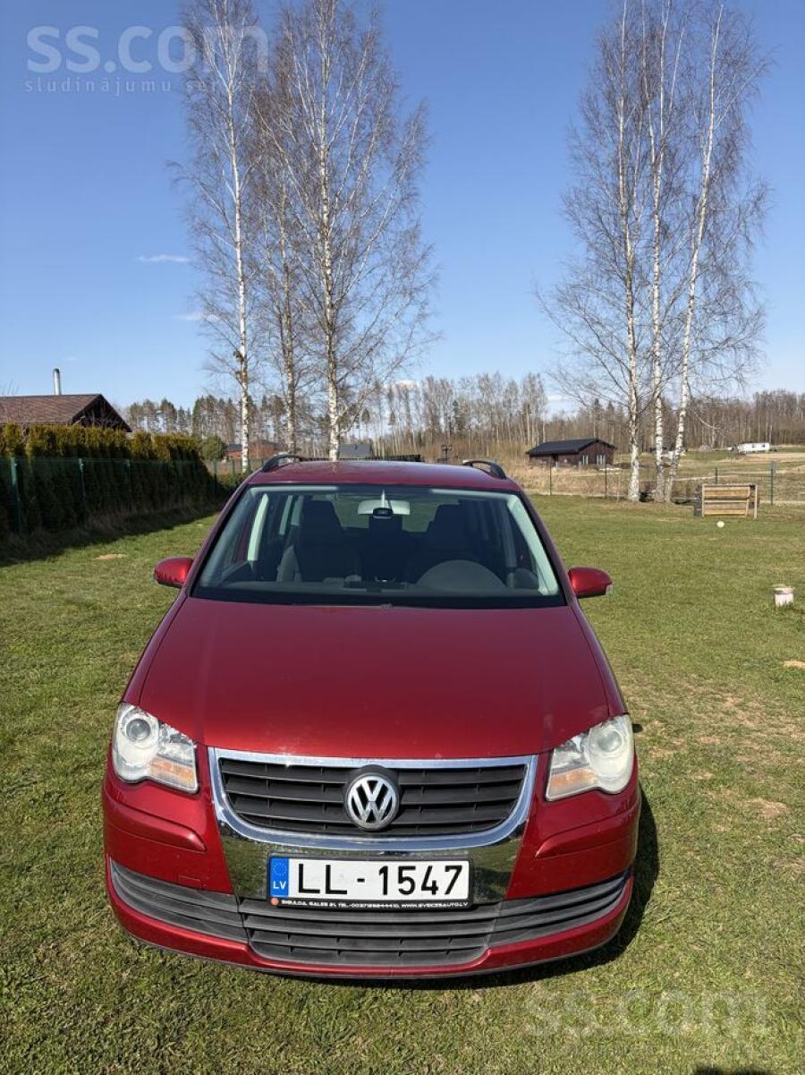Sarkans Volkswagen Touran 2007 Rīga, ar dzinēja tilpumu 1.90 L un nobraukumu 28 tūkst. km par 2500 €, foto 8 vietnē AUTOMOTO.COM.LV