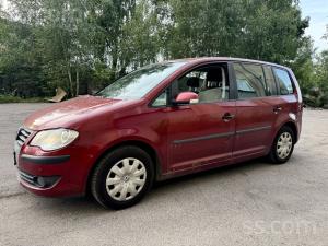 Red Volkswagen Touran 2007 in Riga, with an engine capacity of 1.90 L and mileage of 0 thousand km for 900 €, photo 3 on AUTOMOTO.COM.LV