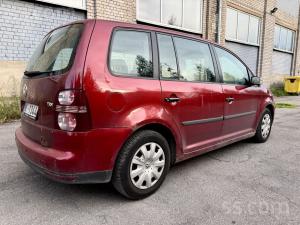 Red Volkswagen Touran 2007 in Riga, with an engine capacity of 1.90 L and mileage of 0 thousand km for 900 €, photo 4 on AUTOMOTO.COM.LV