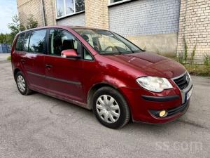 Red Volkswagen Touran 2007 in Riga, with an engine capacity of 1.90 L and mileage of 0 thousand km for 900 €, photo 5 on AUTOMOTO.COM.LV