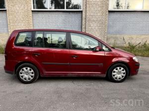 Red Volkswagen Touran 2007 in Riga, with an engine capacity of 1.90 L and mileage of 0 thousand km for 900 €, photo 9 on AUTOMOTO.COM.LV