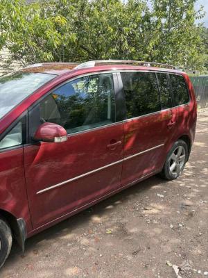 Sarkans Volkswagen Touran 2007 Kauņa, ar dzinēja tilpumu 1.97 L un nobraukumu 392 tūkst. km par 2600 €, foto 5 vietnē AUTOMOTO.COM.LV
