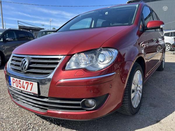 Sarkans Volkswagen Touran 2007 Kauņa, ar dzinēja tilpumu 1.39 L un nobraukumu 196 tūkst. km par 3300 €, foto 6 vietnē AUTOMOTO.COM.LV