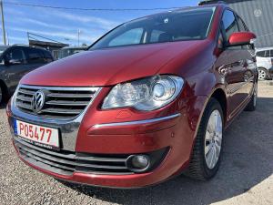 Red Volkswagen Touran 2007 in Kaunas, with an engine capacity of 1.39 L and mileage of 196 thousand km for 3300 €, photo 6 on AUTOMOTO.COM.LV