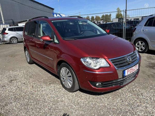 Sarkans Volkswagen Touran 2007 Kauņa, ar dzinēja tilpumu 1.39 L un nobraukumu 196 tūkst. km par 3300 €, foto 7 vietnē AUTOMOTO.COM.LV