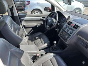 Red Volkswagen Touran 2007 in Kaunas, with an engine capacity of 1.39 L and mileage of 196 thousand km for 3300 €, photo 13 on AUTOMOTO.COM.LV