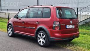 Red Volkswagen Touran 2007 in Riga, with an engine capacity of 1.90 L and mileage of 399 thousand km for 2300 €, photo 5 on AUTOMOTO.COM.LV