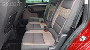Red Volkswagen Touran 2007 in Riga, with an engine capacity of 1.90 L and mileage of 399 thousand km for 2300 €, photo 8 on AUTOMOTO.COM.LV