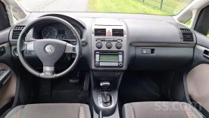 Red Volkswagen Touran 2007 in Riga, with an engine capacity of 1.90 L and mileage of 399 thousand km for 2300 €, photo 10 on AUTOMOTO.COM.LV