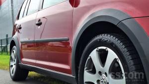 Red Volkswagen Touran 2007 in Riga, with an engine capacity of 1.90 L and mileage of 399 thousand km for 2300 €, photo 13 on AUTOMOTO.COM.LV