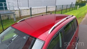 Red Volkswagen Touran 2007 in Riga, with an engine capacity of 1.90 L and mileage of 399 thousand km for 2300 €, photo 24 on AUTOMOTO.COM.LV